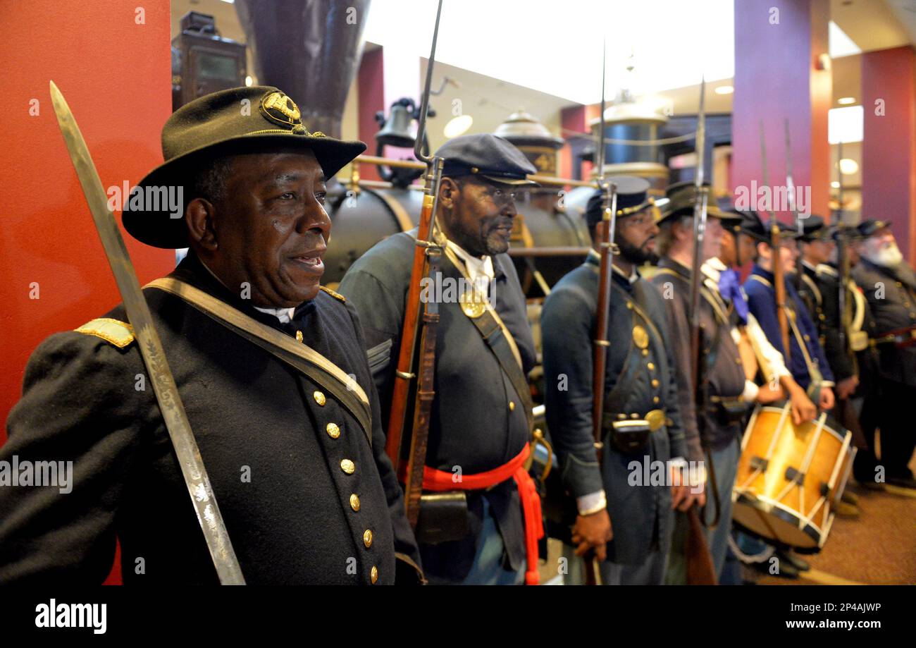 Black Civil War re-enactors Lt James Hayes (from left), Samuel ...