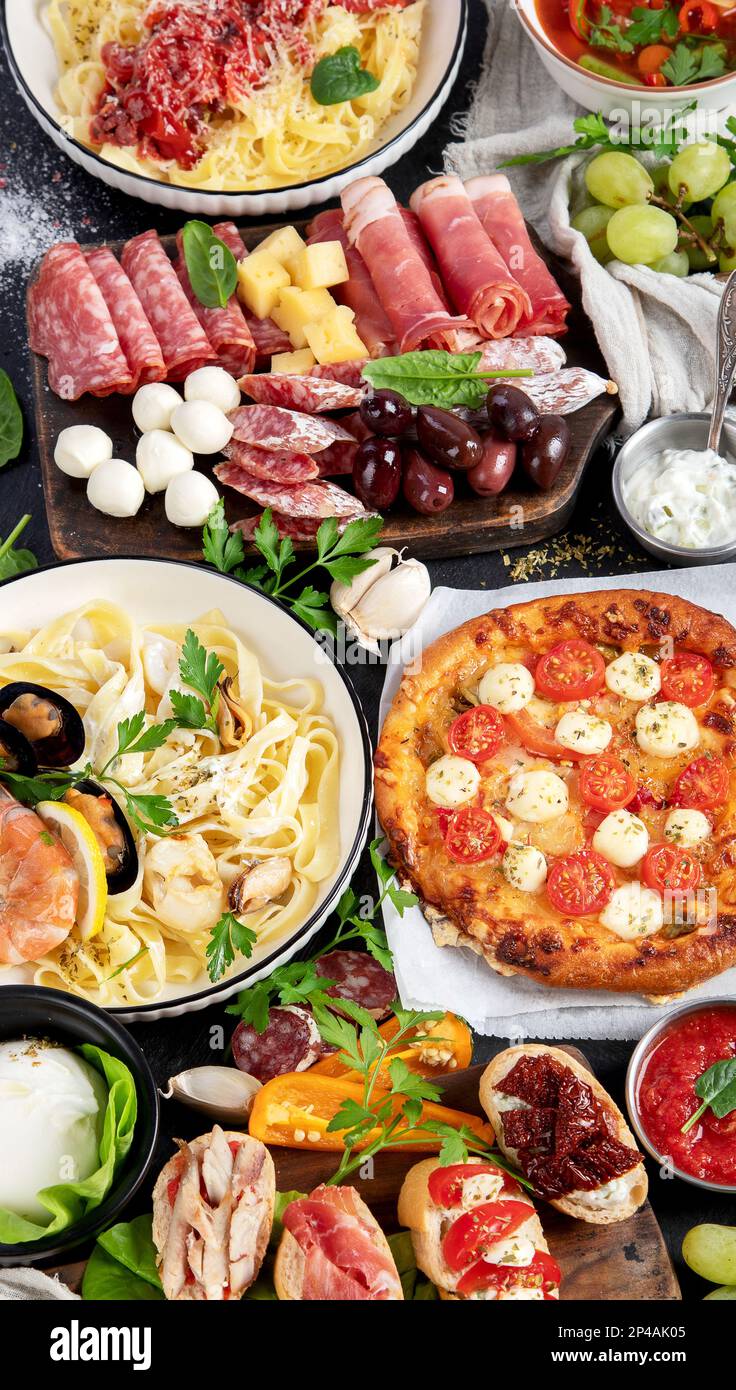 Italian food dishes on dark background. Traditional italian cuisine ...