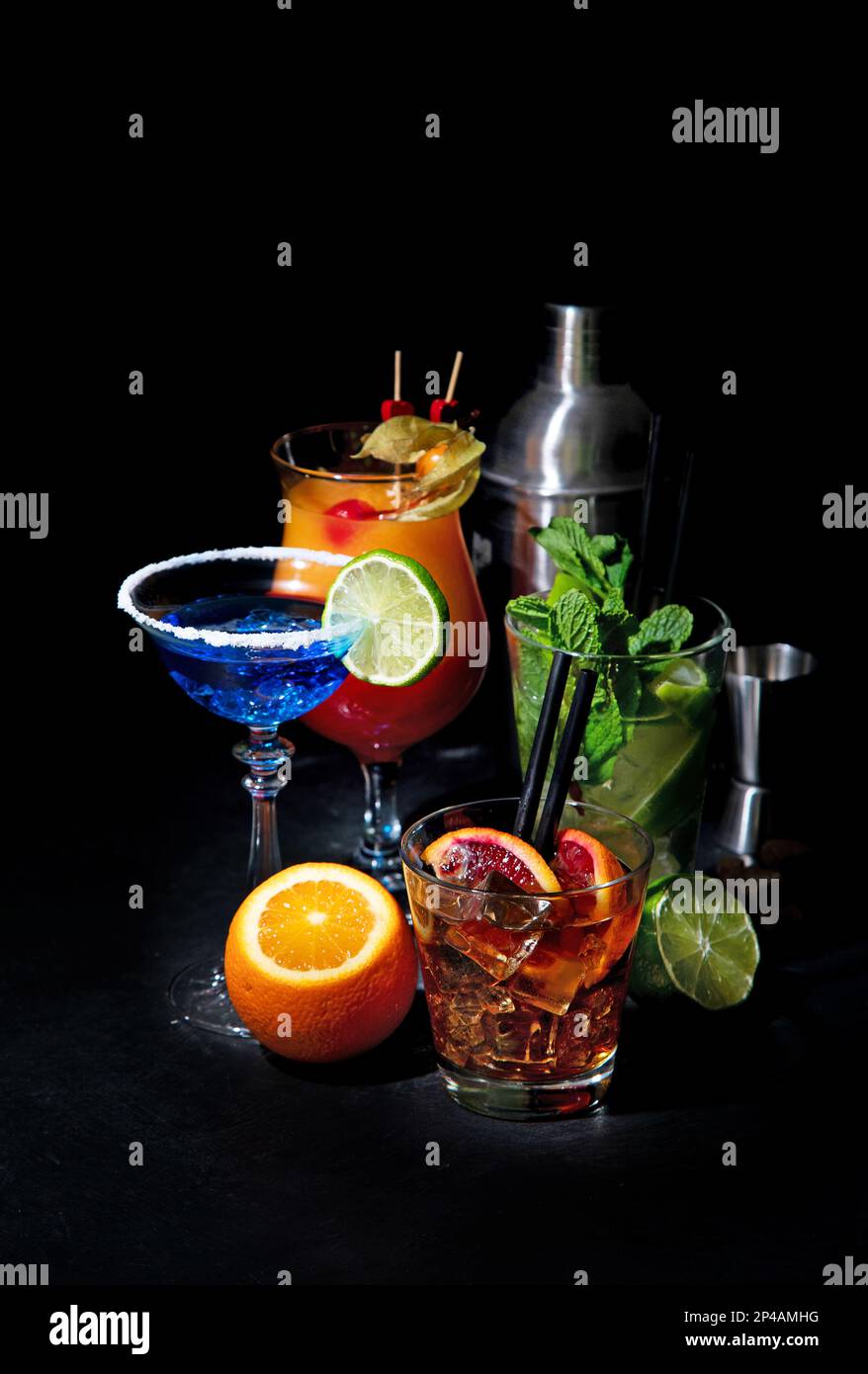 Set of various colorful cocktails on black background. Classic long ...