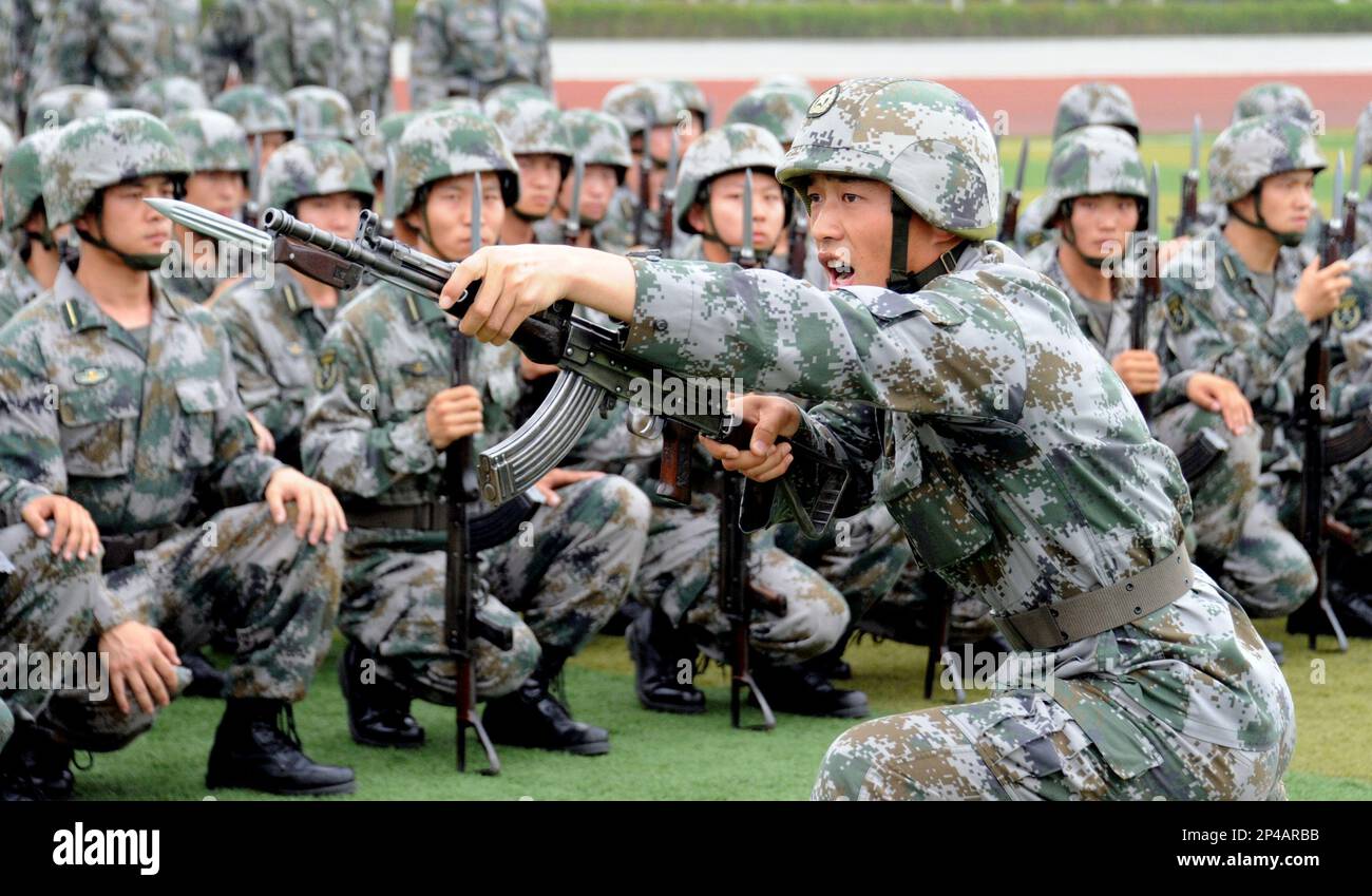 Cadet members of China's People's Liberation Army (PLA) participate in ...