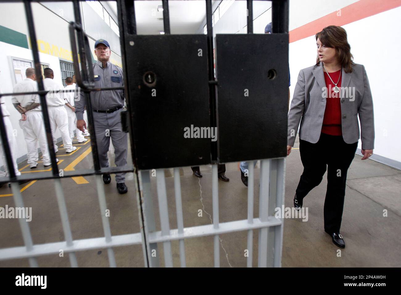 This photo taken July 16, 2014, shows Warden Tracy Bailey, right ...