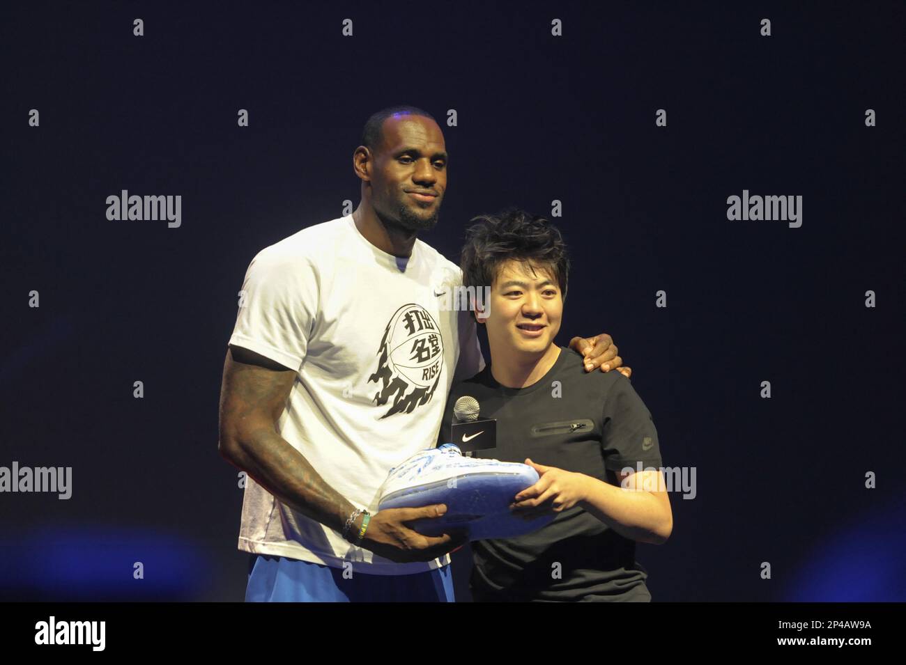 NBA superstar LeBron James, left, poses with Chinese pianist Lang Lang ...