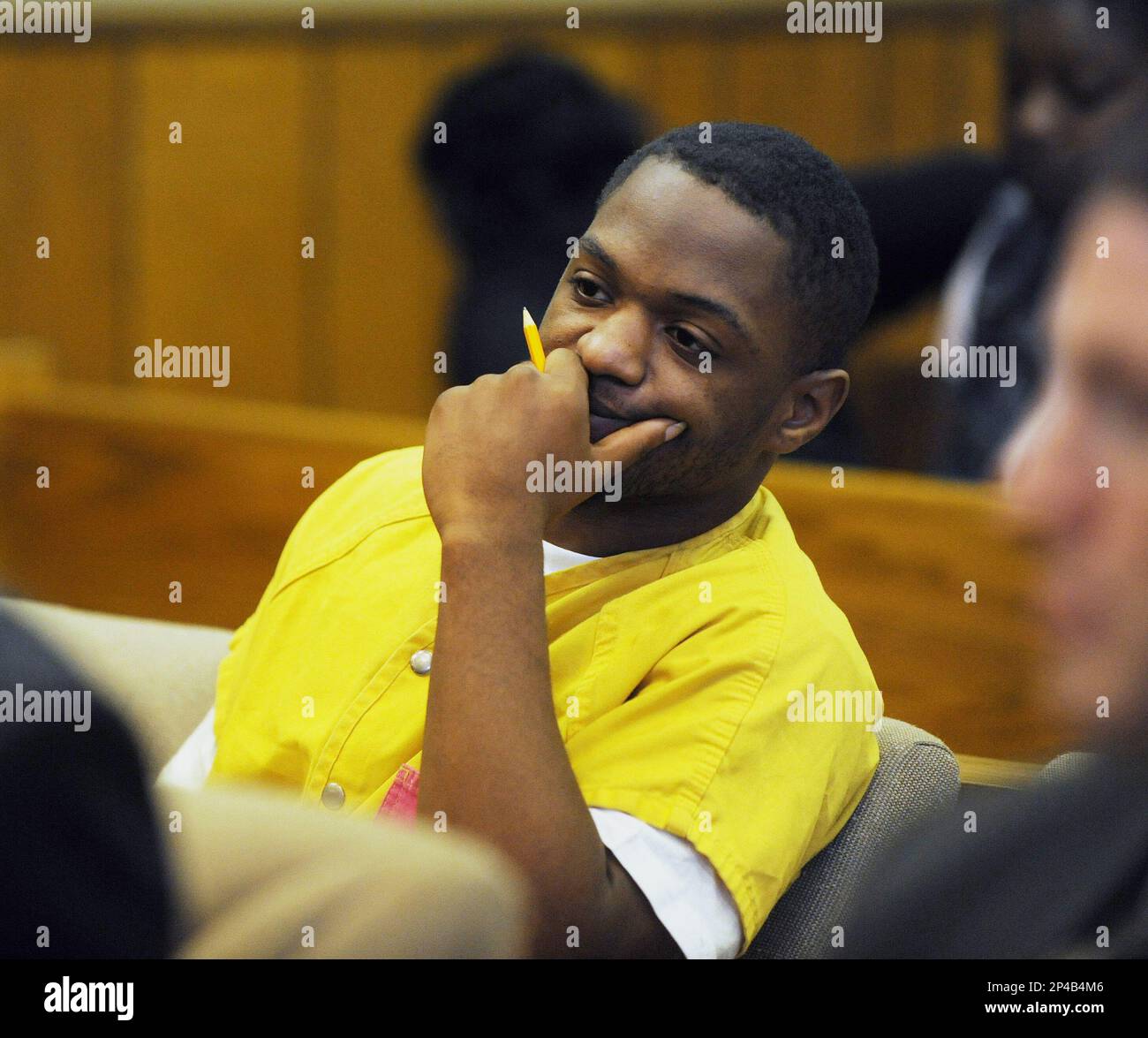 Raymone Jackson listens in court as he hears testimony during a hearing ...