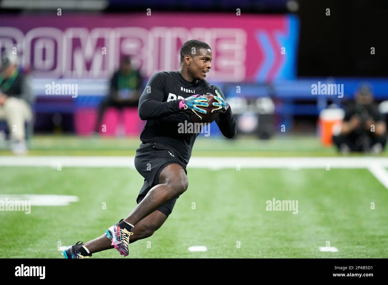 Texas A&M running back Devon Achane runs a drill at the NFL football ...