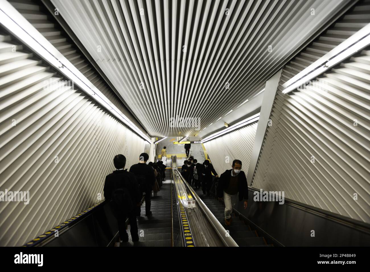 Going down the escalator in Shinjuku station in Tokyo, Japan Stock ...