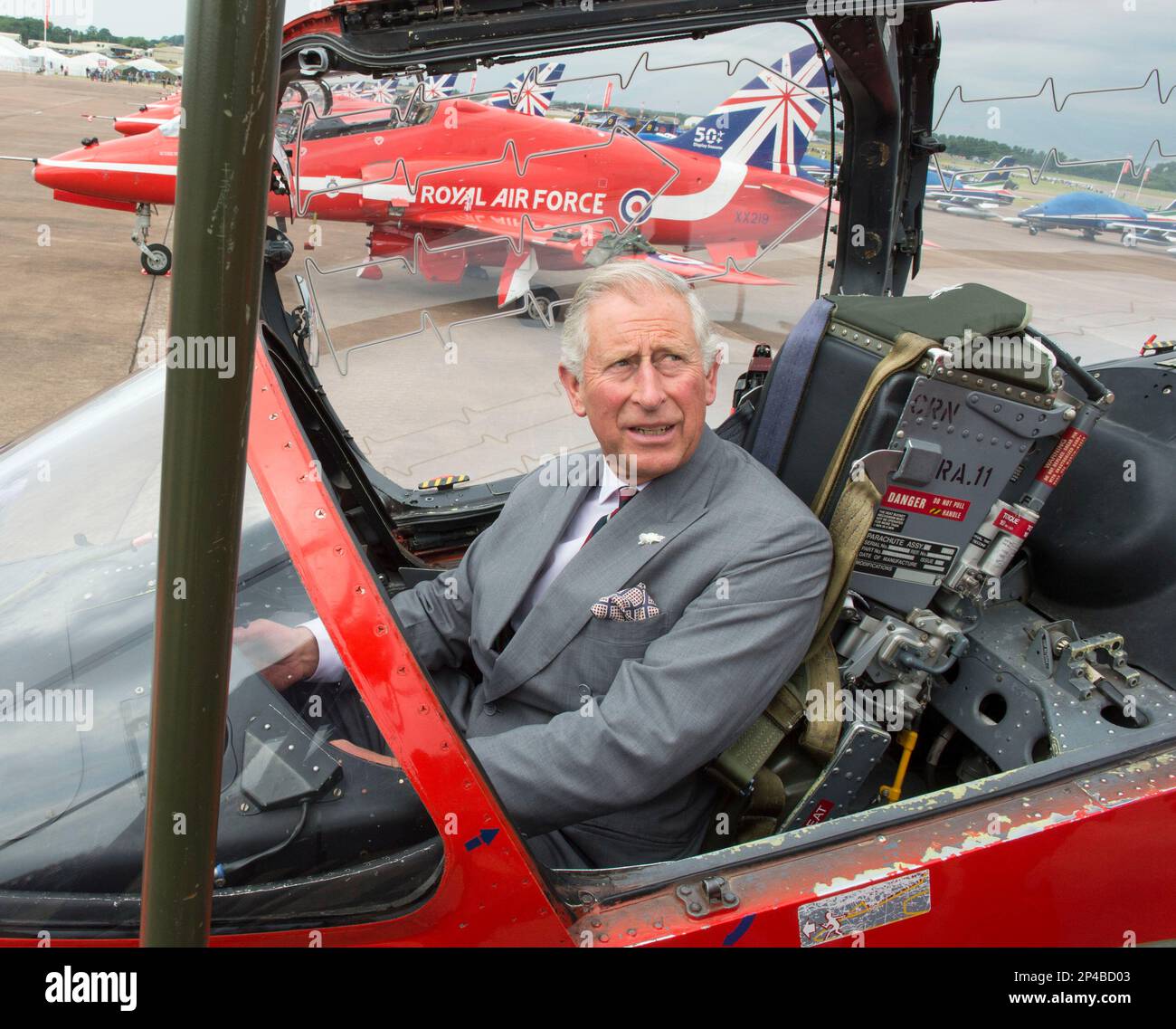 Britain's Prince Charles sits in a cockpit as he visits The Royal ...