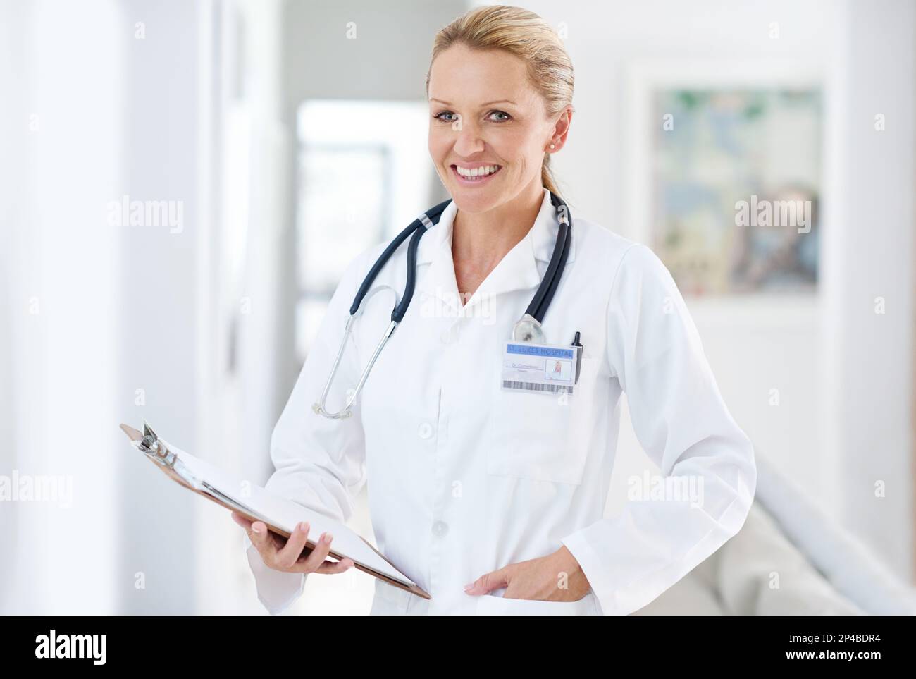 Working hard to keep you healthy. Portrait of a female doctor standing ...