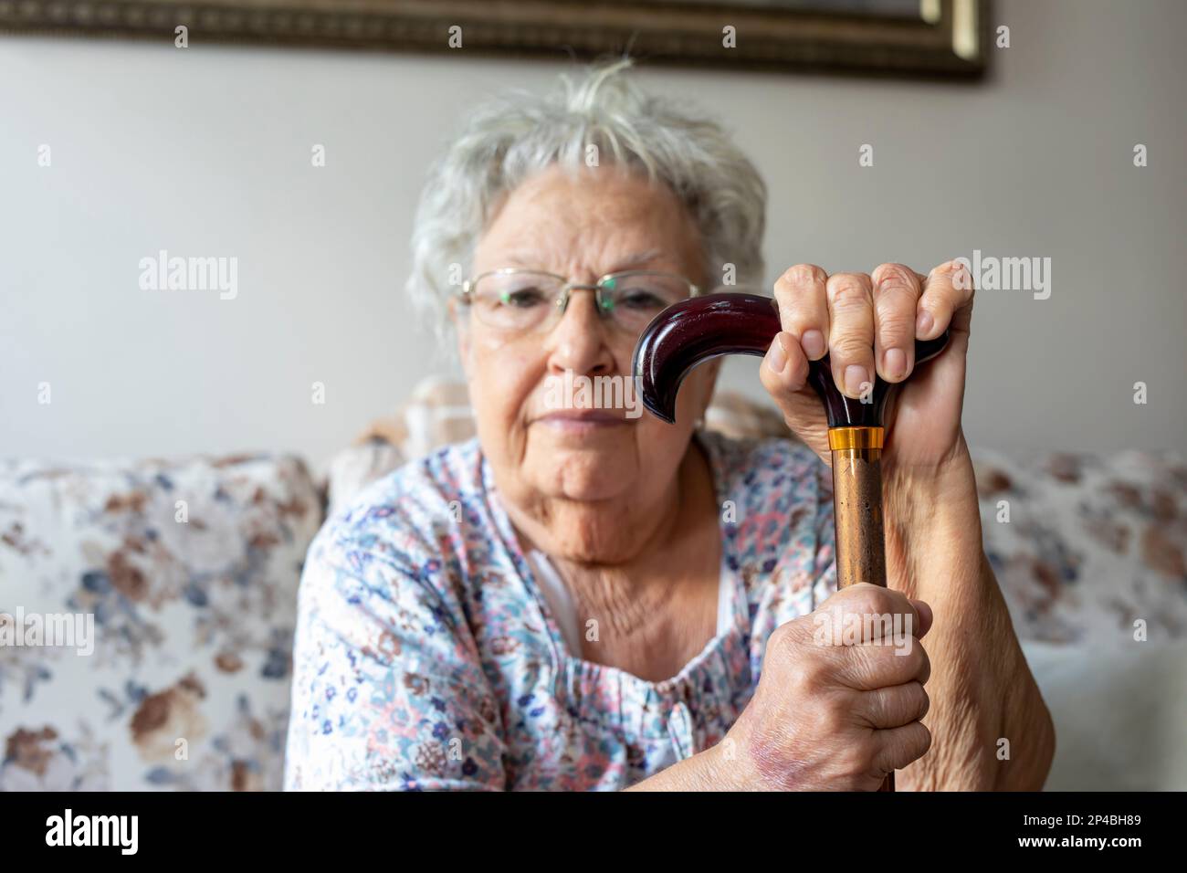 Elderly adult walking stick hi-res stock photography and images - Alamy