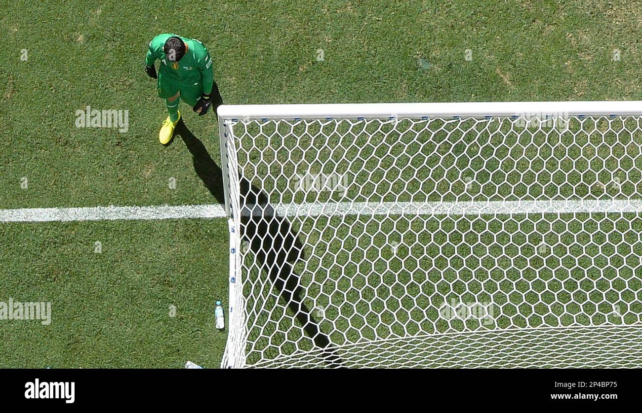 Belgium goalkeeper Thibaut Courtois walks on the pitch during the World ...
