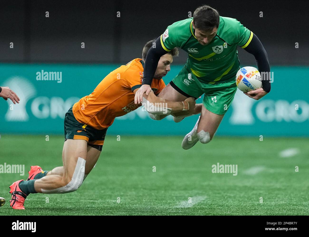 Australia's Josh Turner, left, tackles Ireland's Billy Dardis during ...