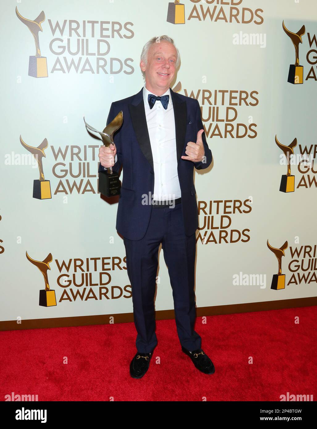Mike White arrives at The 2023 Writers Guild Awards Press Room held at ...