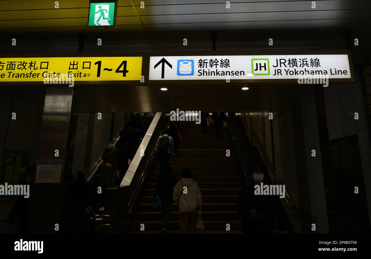 Passengers climbing up to the Shinkansen train platform in Shin-Yokohama station in Japan Stock ...