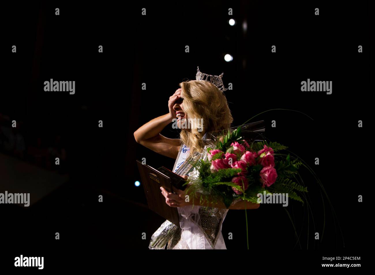 Courtney Garrett, formerly Miss State Fair of Virginia, walks down the ...