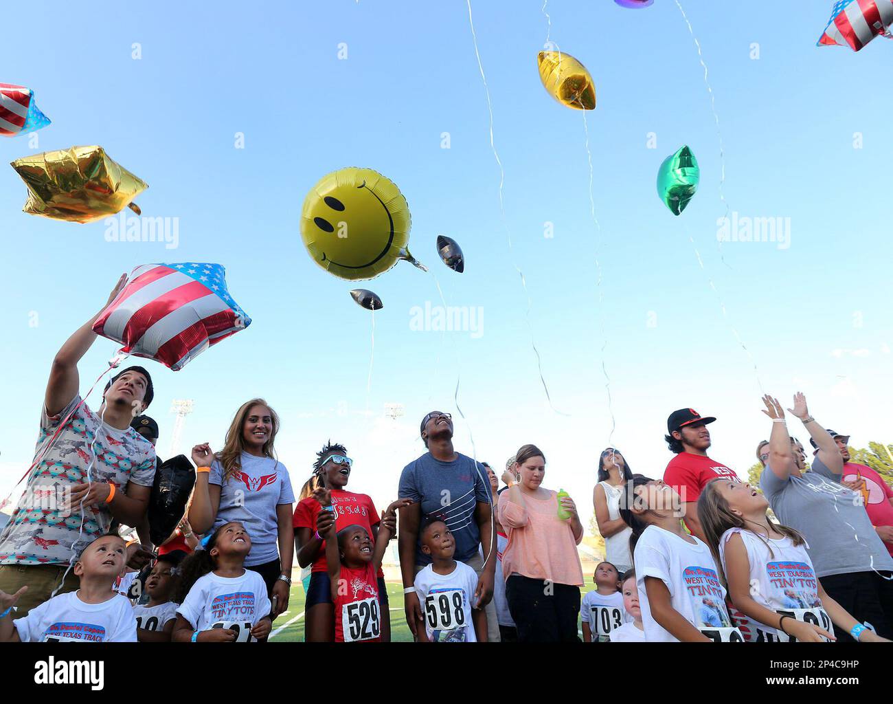 Tiny tots competitors release balloons during the opening ceremony of ...