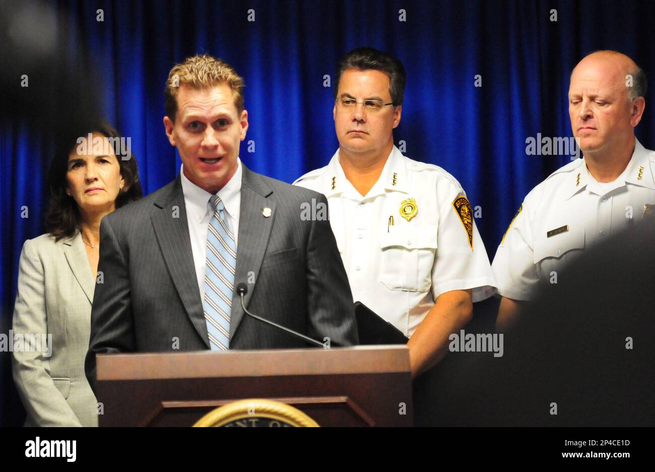 ATF Special Agent in Charge Daniel J. Kumor speaks with the media while ...