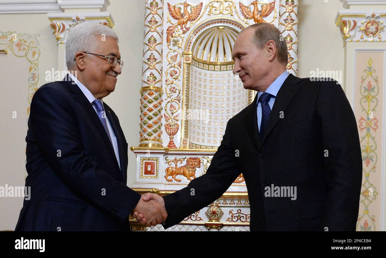 Russian President Vladimir Putin, right, and Palestinian President ...