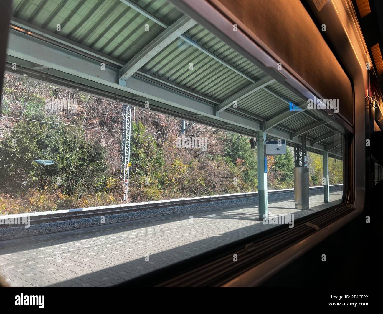 a platform from a train station Stock Photo - Alamy