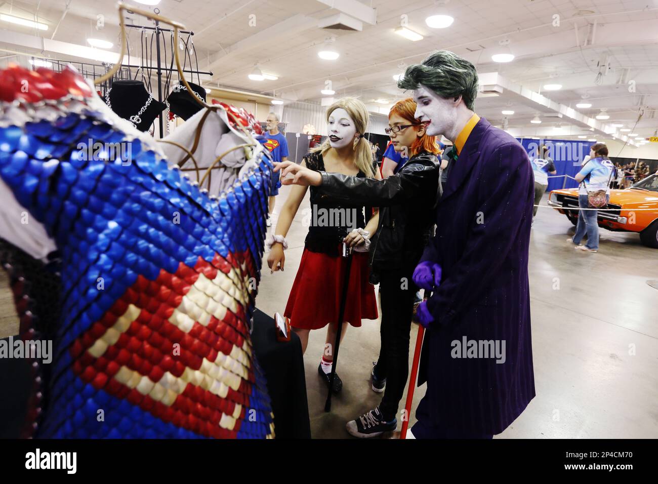 From left, Megan Linke as Harley Quinn, Kristina Taylor as Black Widow ...