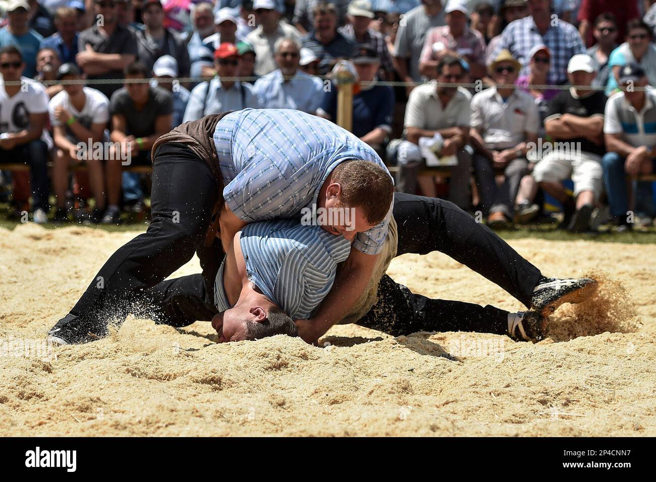 Simon Anderegg, top, challenges with Michael Nydegger during the so ...