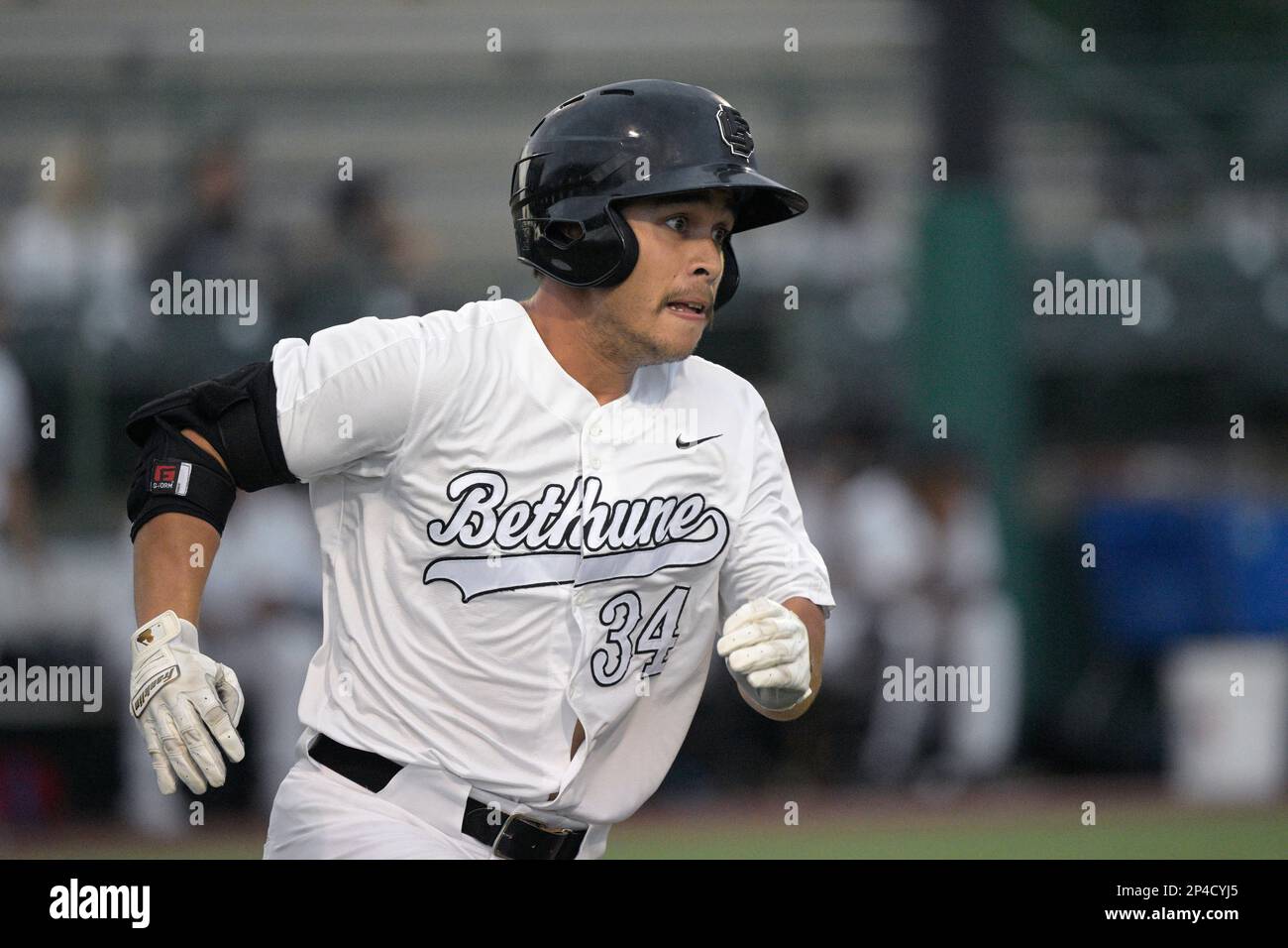Bethune-Cookman's Garrett Chun (34) runs after hitting a pitch during ...