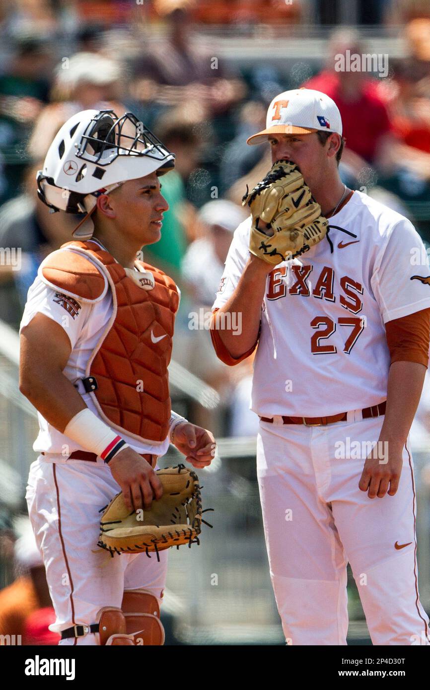 Texas Longhorns catcher Tres Barrera (1) talks with pitcher Travis Duke ...