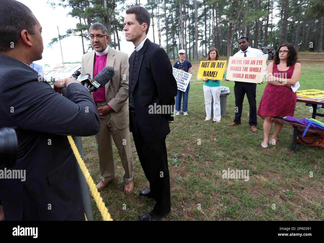 Episcopal Bishop Robert Wright, left, and the Rev. Joseph Shippen speak ...