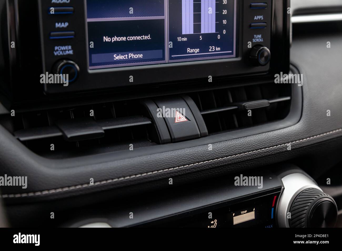 Black plastic block of car control panel with red emergency stop button ...