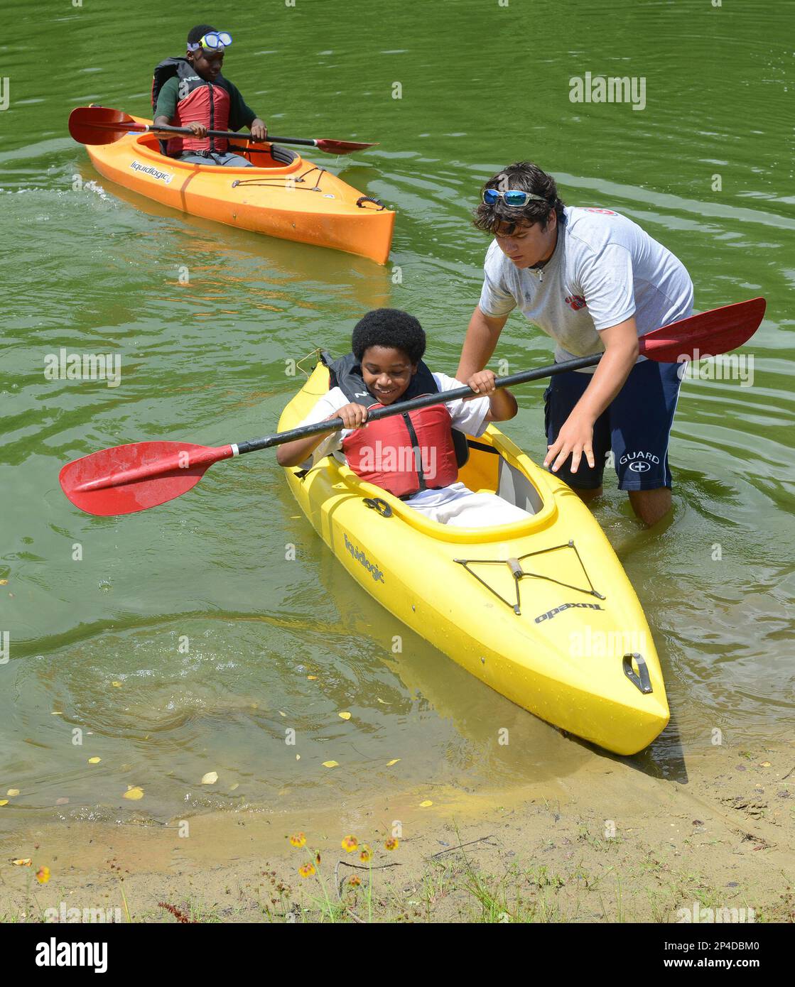 Jacob Clark helps Bruce Cannon into the water at Love a Sea Turtle's ...