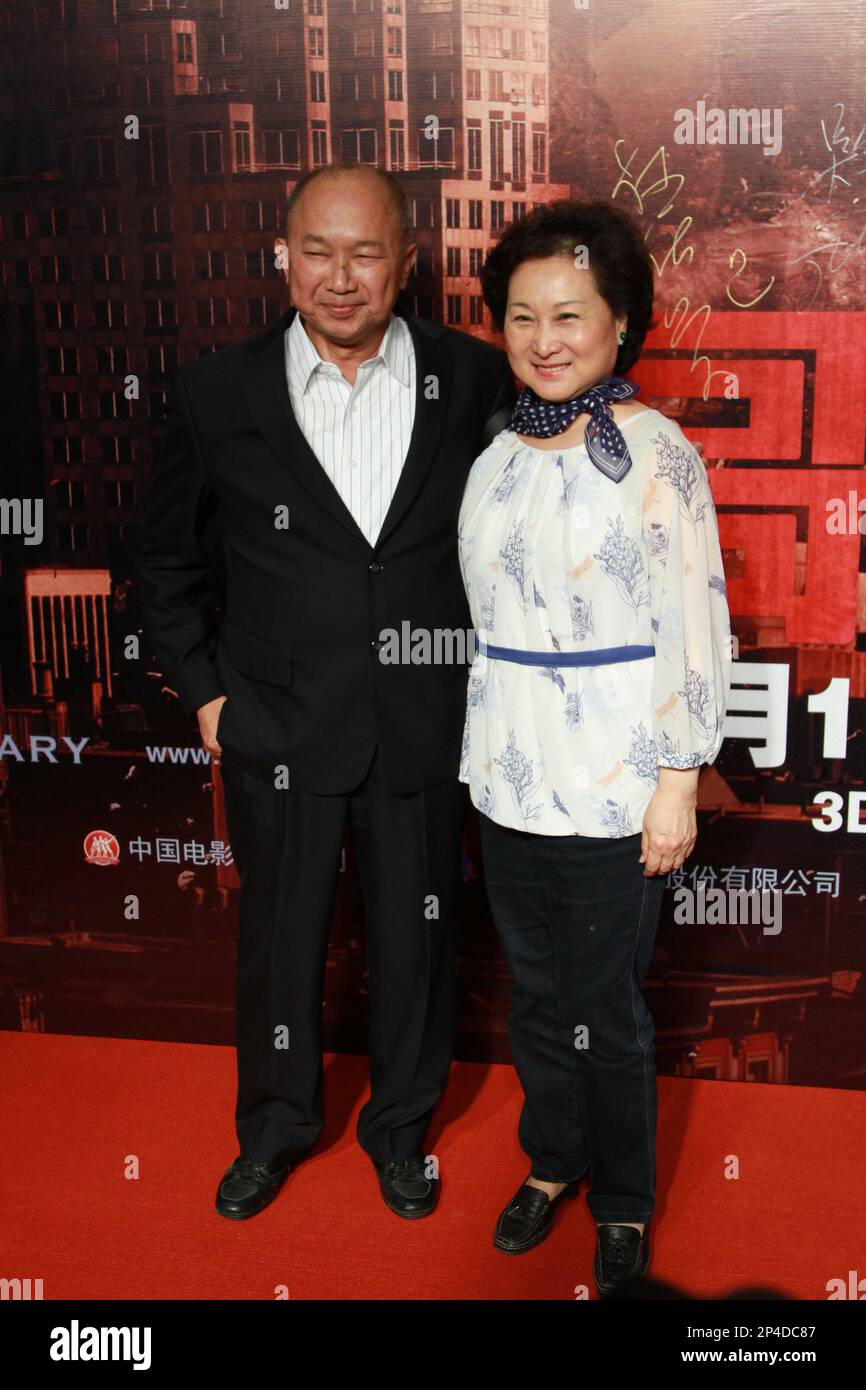 Director John Woo and his wife Annie Woo attend "Godzilla" premiere in ...