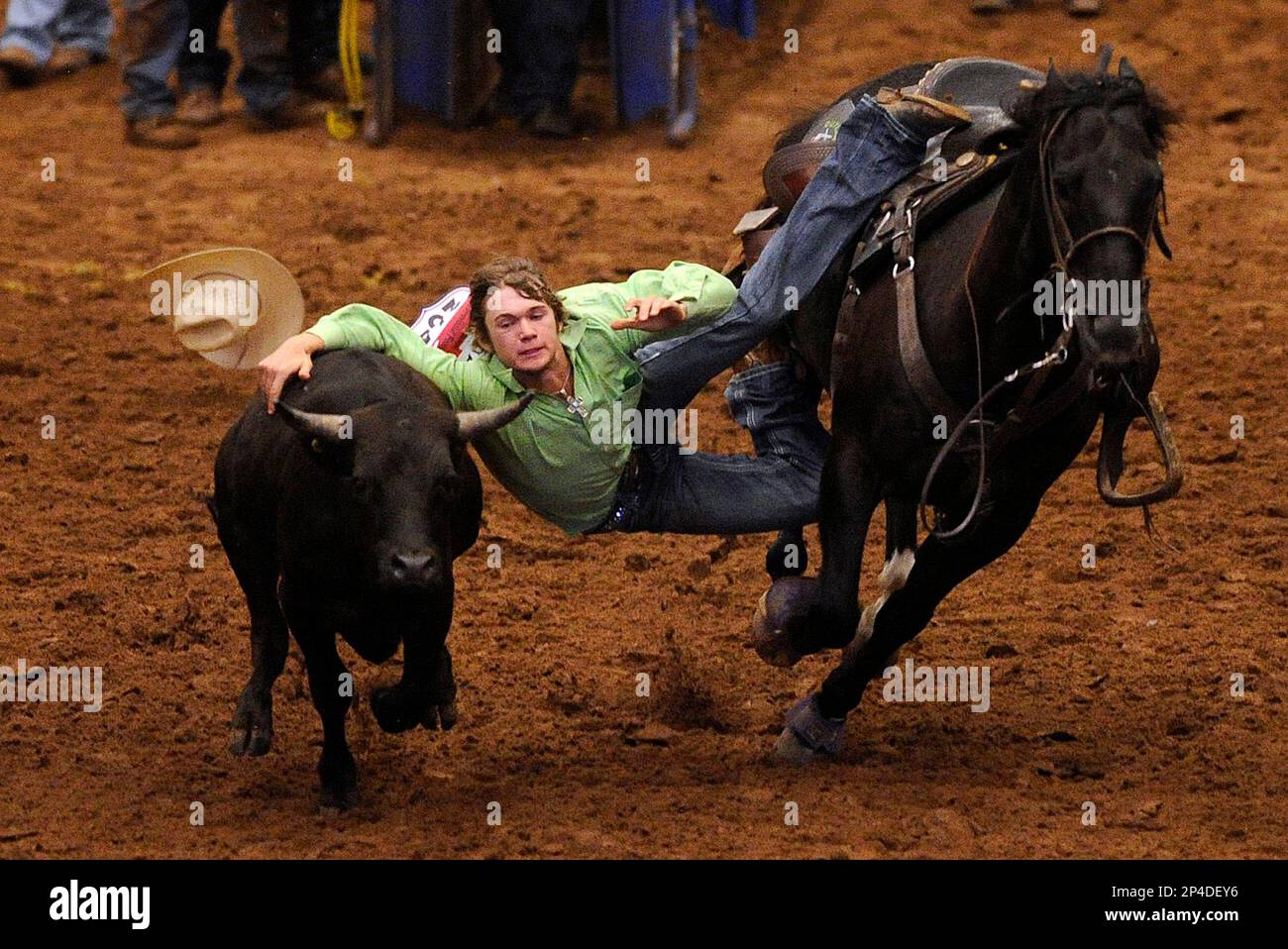 Simeon Beauchamp, from Brookeland, Texas, loses his hat trying to pull ...