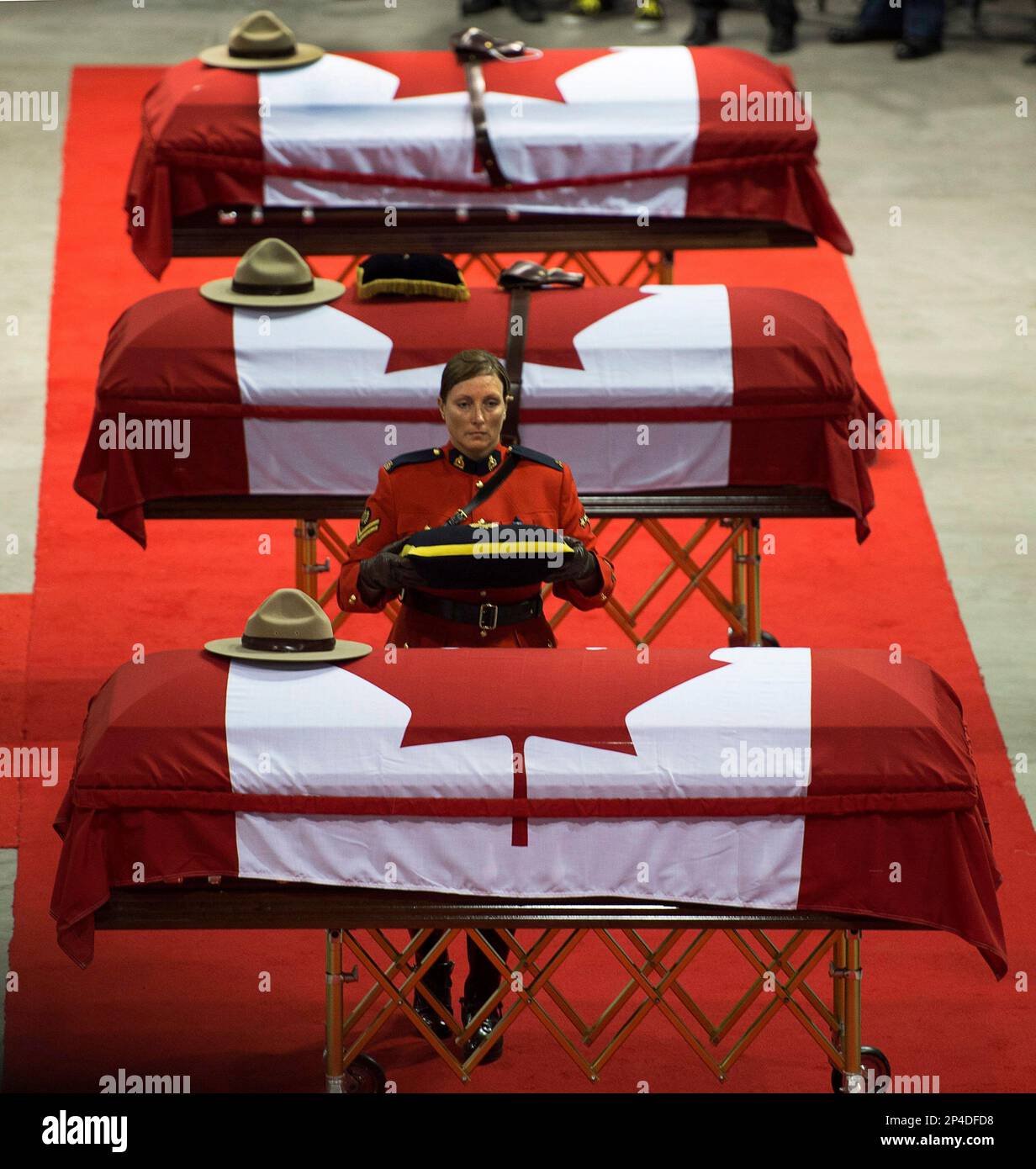 The caskets of the three RCMP officers who were killed in the line of ...