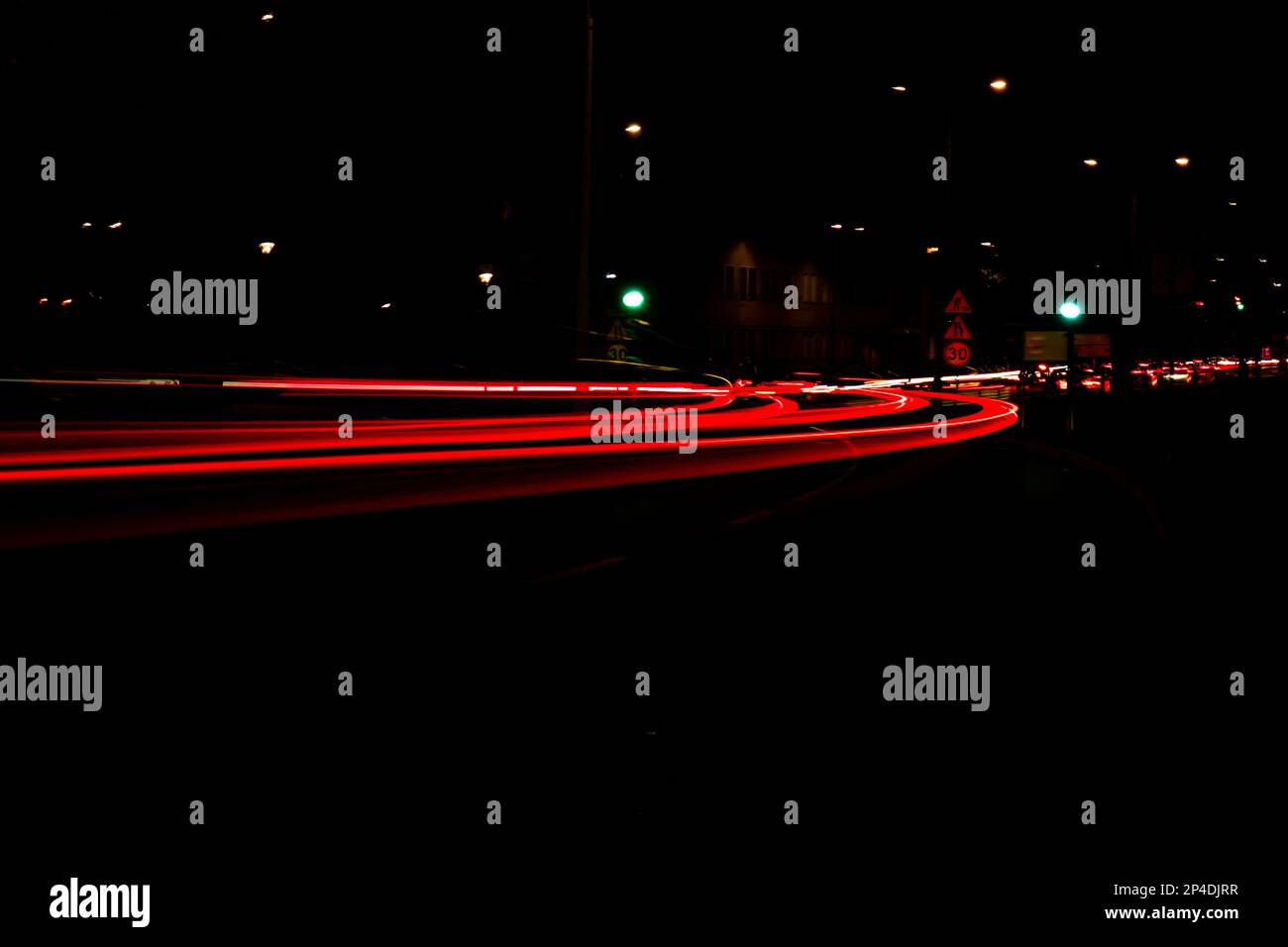 Lights of cars at night. Street line lights. Night highway city. Long ...