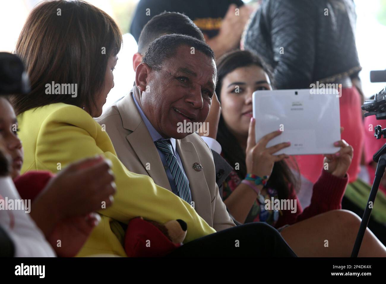 The father of Felix Trinidad smiles as his son is inducted onstage ...