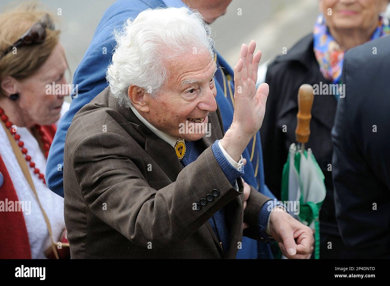 US WWII photographer Tony Vaccaro waves to the audience during the ...