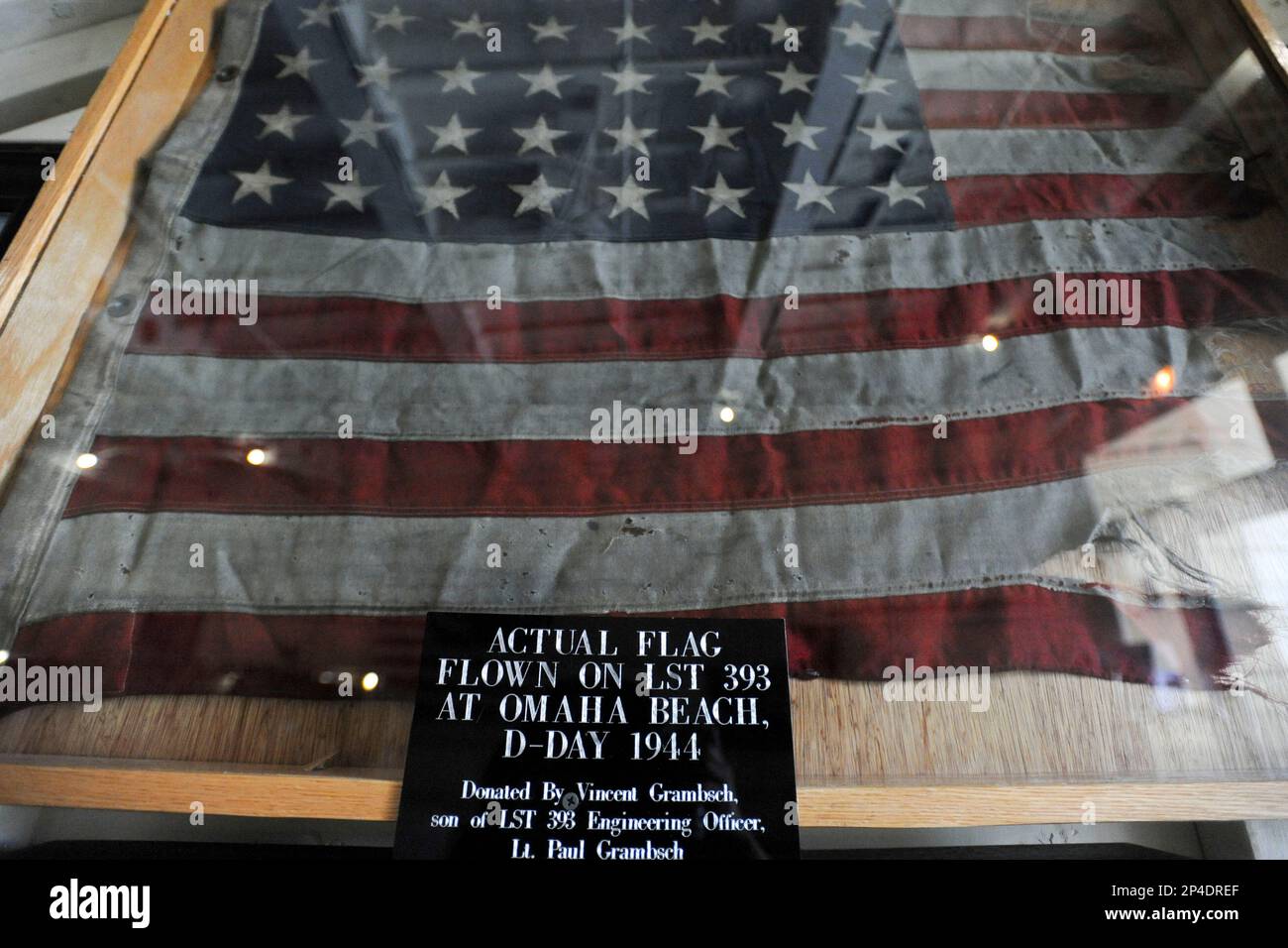The flag flown on the USS LST 393 at Omaha Beach on D-Day 1944 is on ...