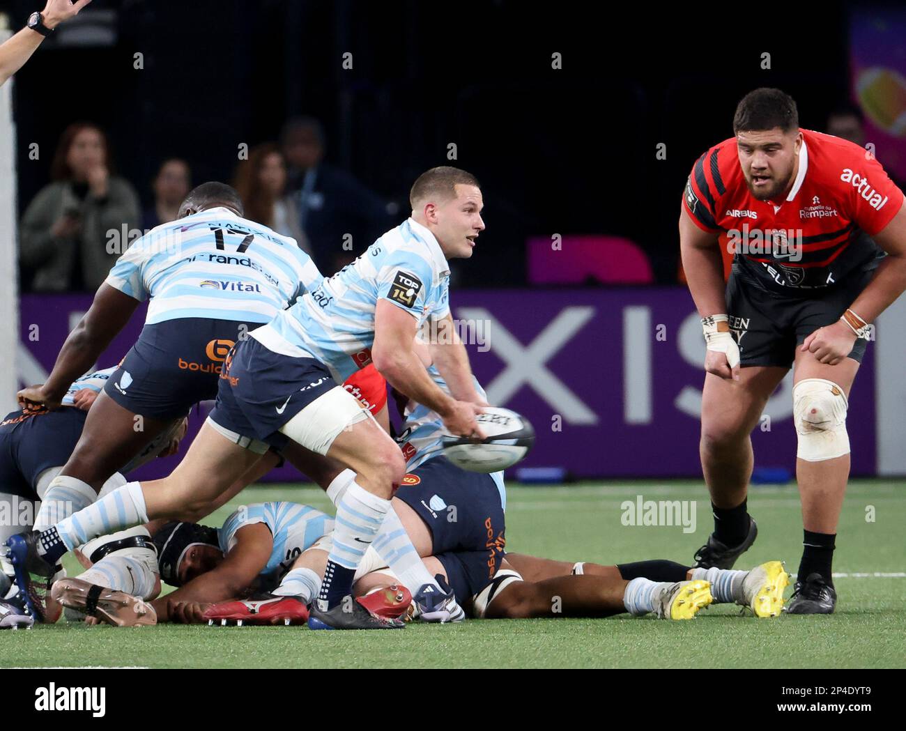 Antoine Gibert of Racing 92, Emmanuel Meafou of Stade Toulousain during ...
