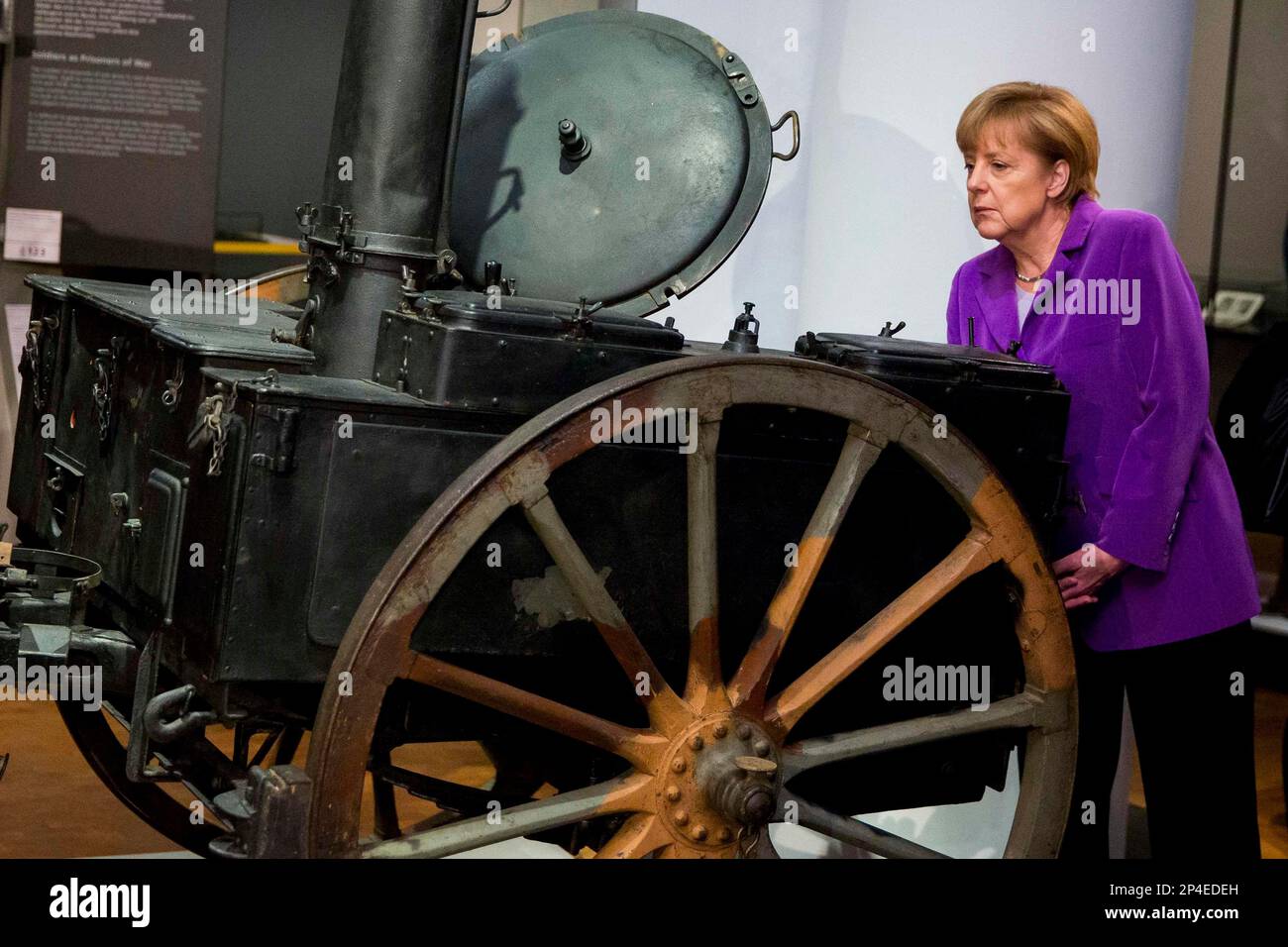 German Chancellor Angela Merkel, looks at a horse drawn field kitchen ...