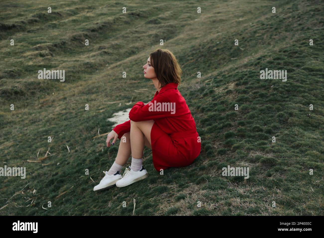 Woman in red summer dress walking hi-res stock photography and images ...
