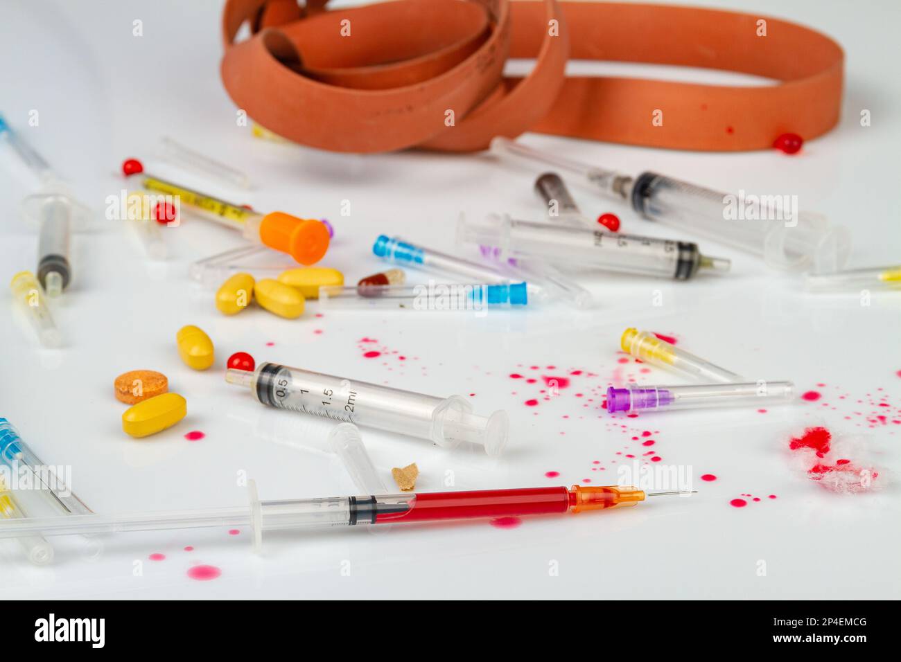 Assorted medical drugs and syringes on white background. Various ...