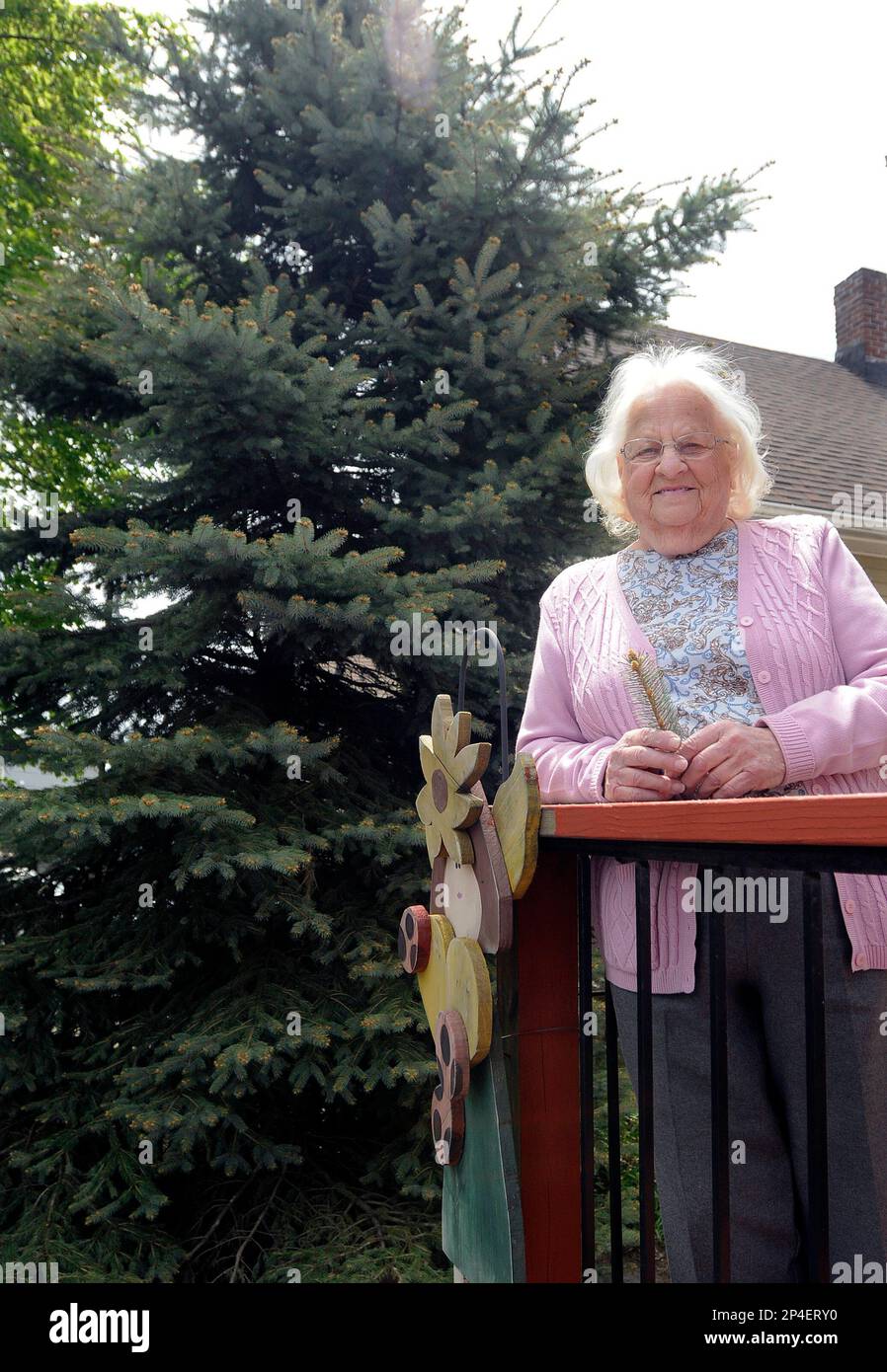 In this May 13, 2014 photo, Josephine "Dodo" Ratkauskas holds stands ...