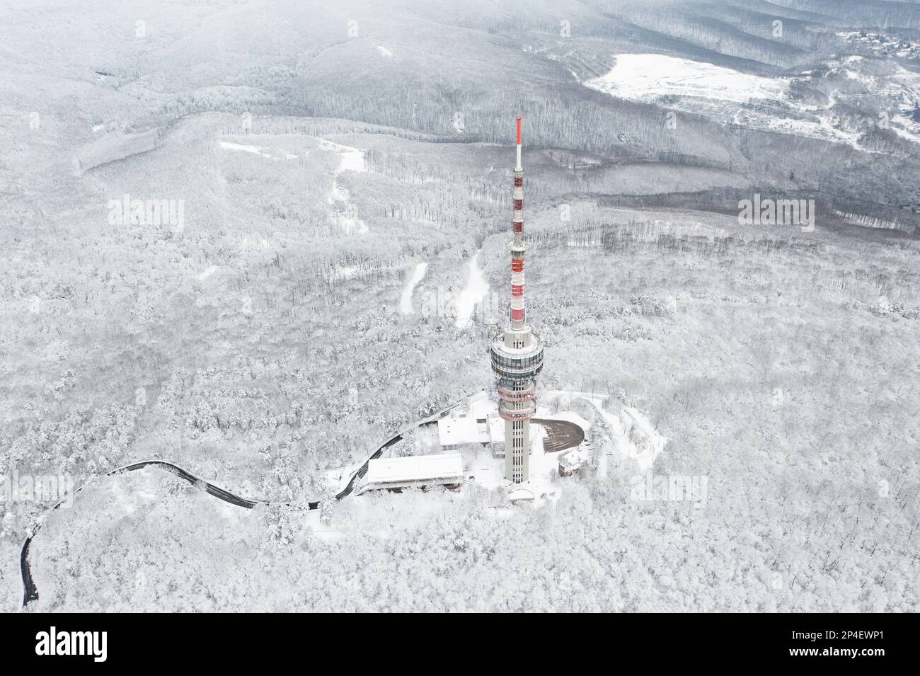 Aerial view of beautiful snowy landscape with TV tower Stock Photo - Alamy