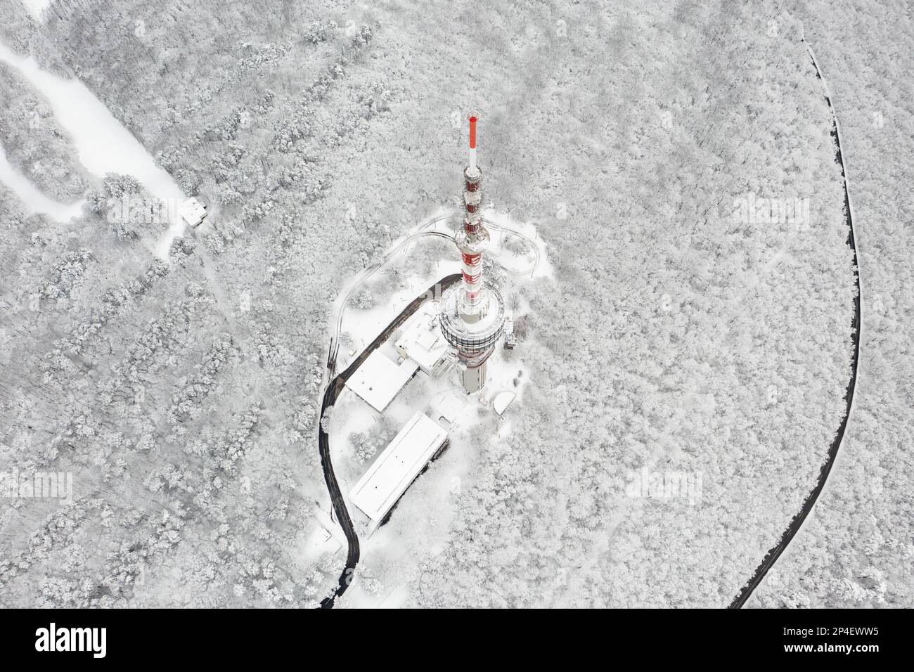 Aerial view of beautiful snowy landscape with TV tower Stock Photo - Alamy