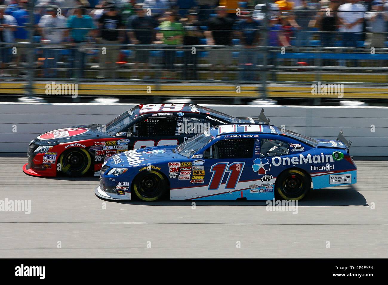 Elliott Sadler (11) and James Buescher (99) during the NASCAR ...