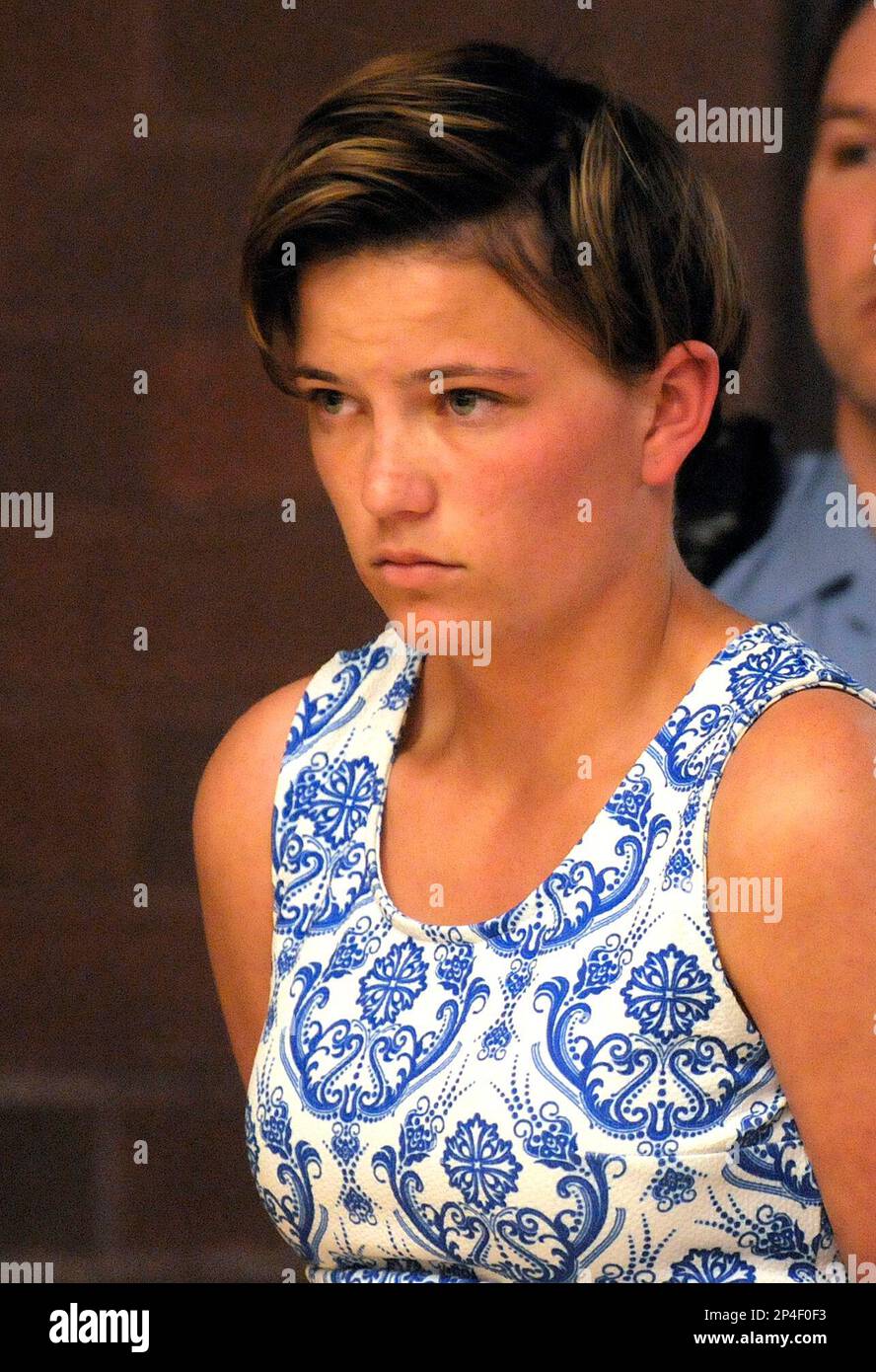 Danielle Shea, 22, of Quincy, Mass., stands as she is charged with ...