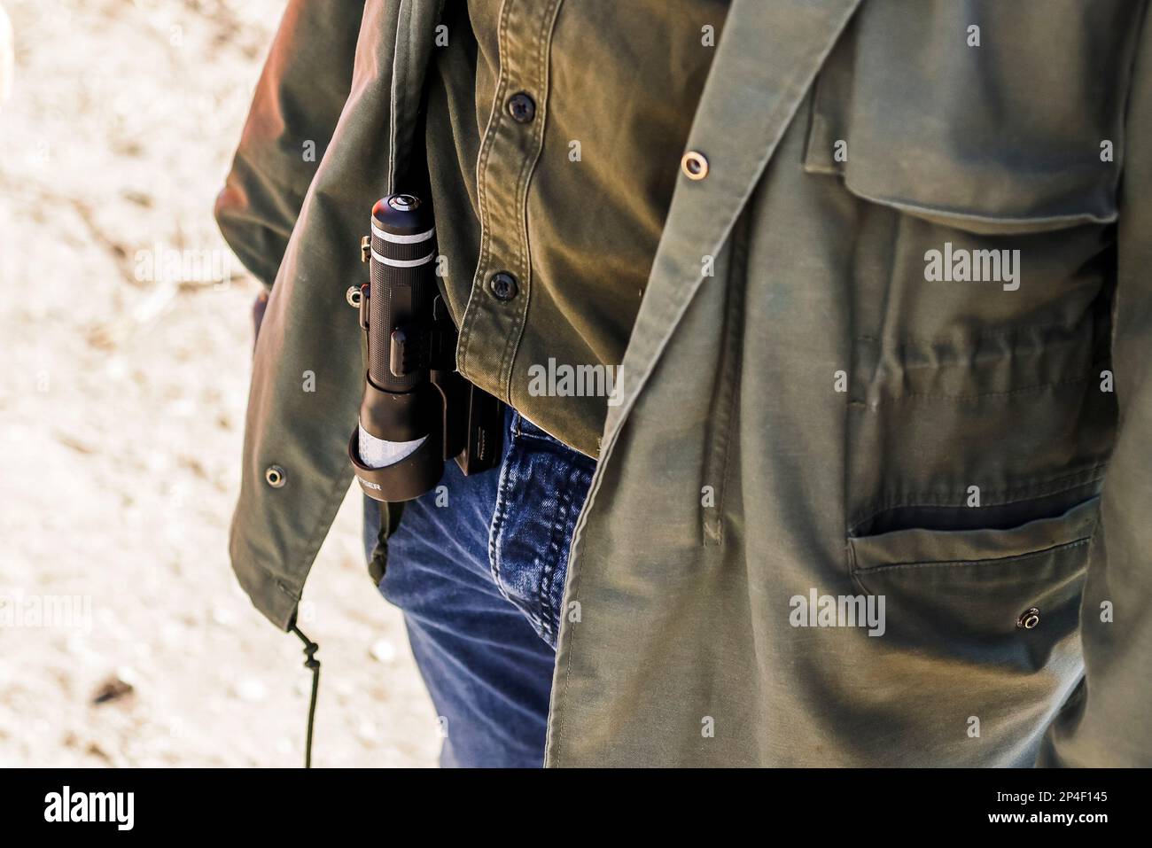 Kropp, Germany. 28th Feb, 2023. A flashlight is attached to the pants ...