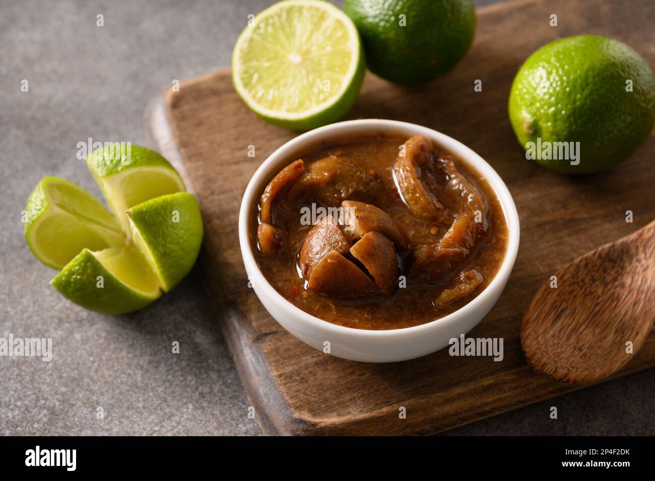 Traditional Sri Lankan Lime Pickle of lime, salt, chilli, pepper on ...