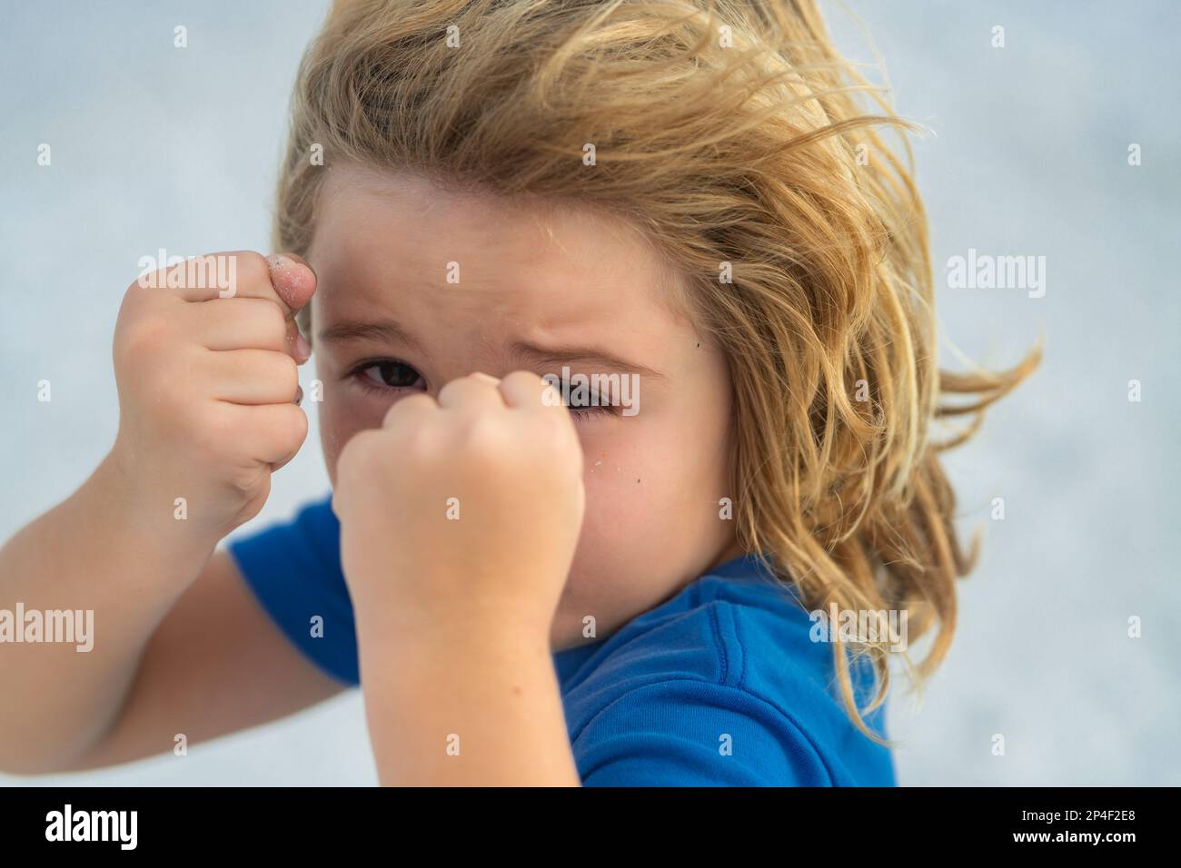 Enraged kid boy with angry expression. Angry hateful little anger boy ...