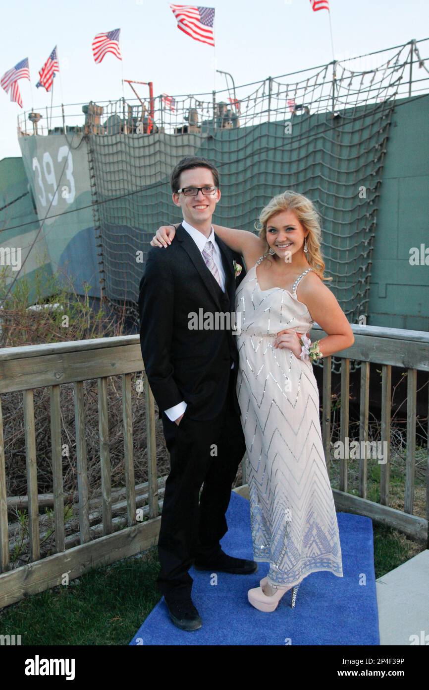Gabriella Mitchell and Mike Valachovics pose for a photo after arriving ...