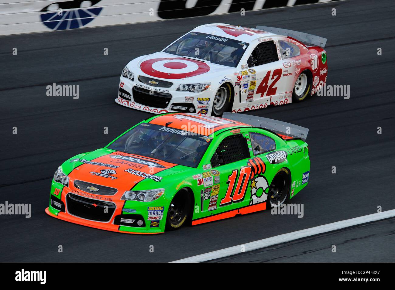 (10) Danica Patrick races with (42) Kyle Larson during the NASCAR ...