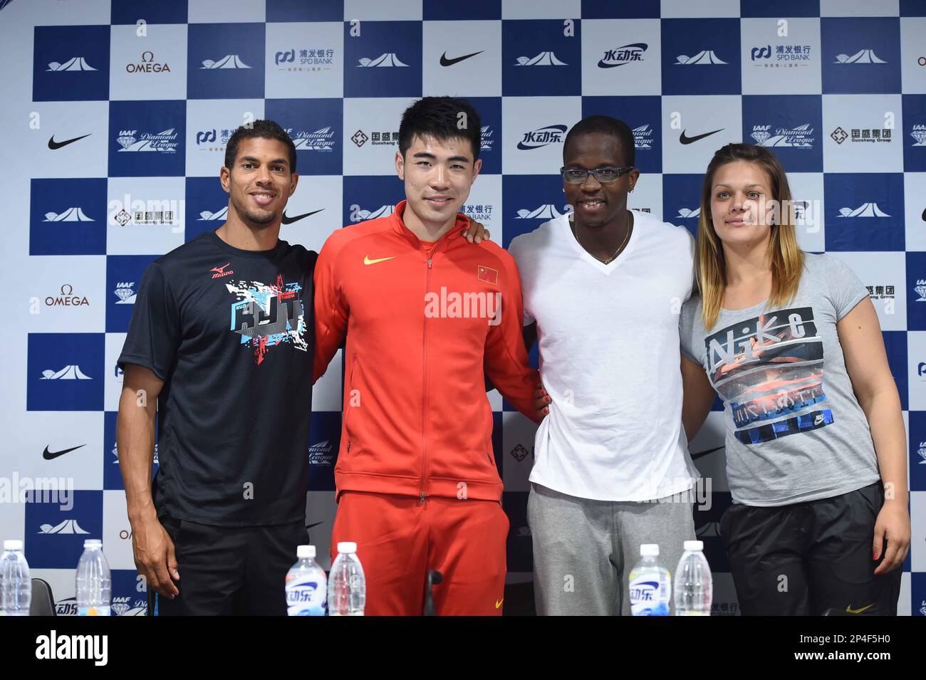(From left) American hurdler Ryan Wilson, Chinese hurdler Xie Wenjun ...